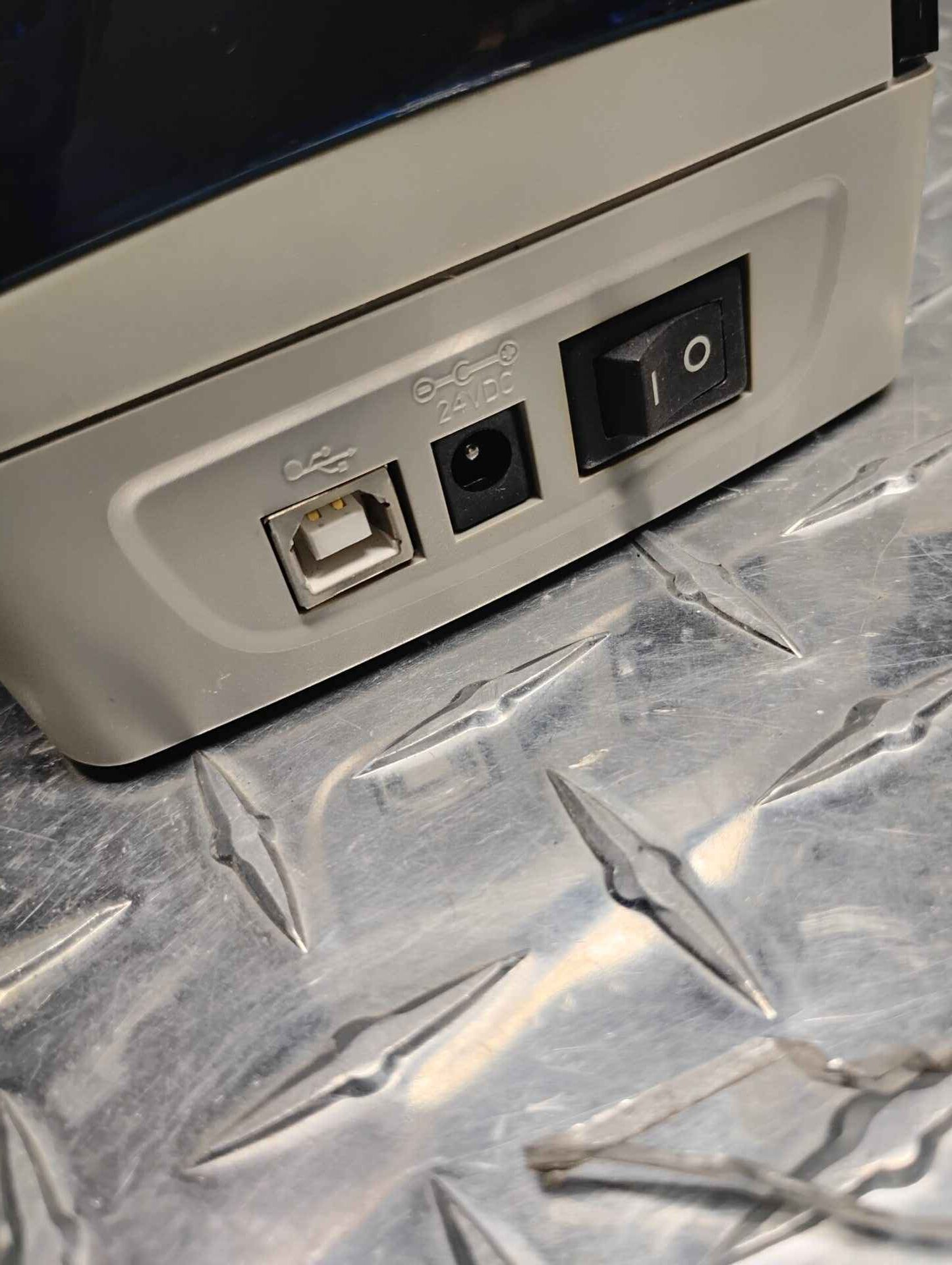 Personal label printer missing power cord - Quick Bids